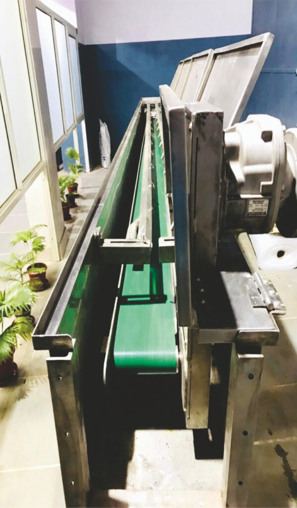 Conveyorised Cooling Tank – KEGN Automation